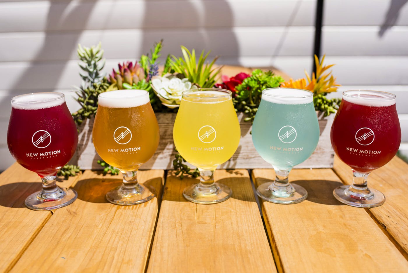 New Motion Beverages | New Motion Beverages & Embolden Beer Co.